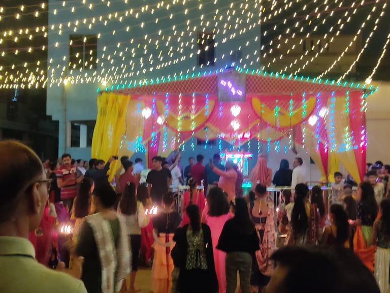 Photo-video of Nortani Mass Aarti, Vesbhusha and Garab at Triveni Trilok Park Society's Five in ...