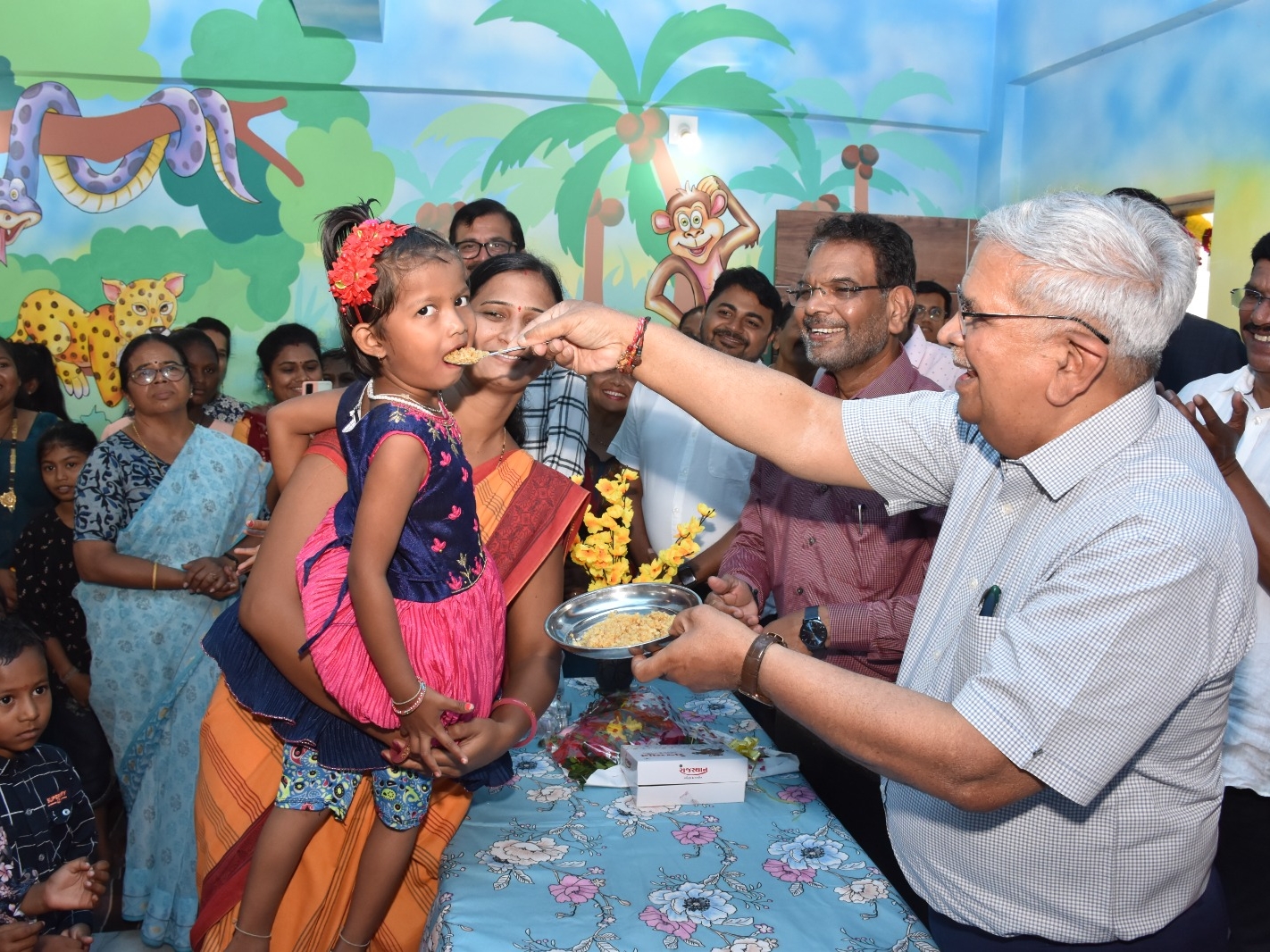 In Pardi, state finance minister Kanubhai Desai handed over Rs ...