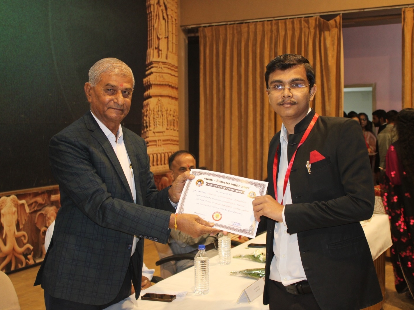 Organized by Anand-Vidyanagar Ahir Samaj of Anjar; Valamjibhai Honbal ...