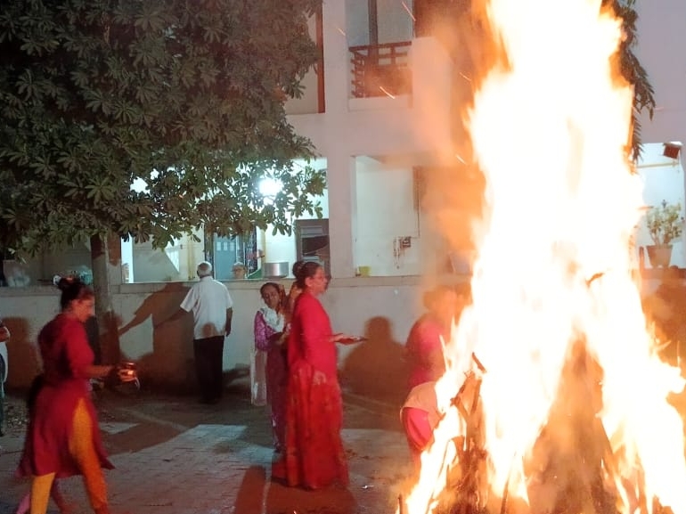Holika Dahan was celebrated by the Tulsikunj Society of Ghodasar ...