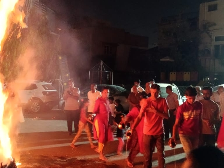 Holika Dahan was celebrated by the Tulsikunj Society of Ghodasar ...