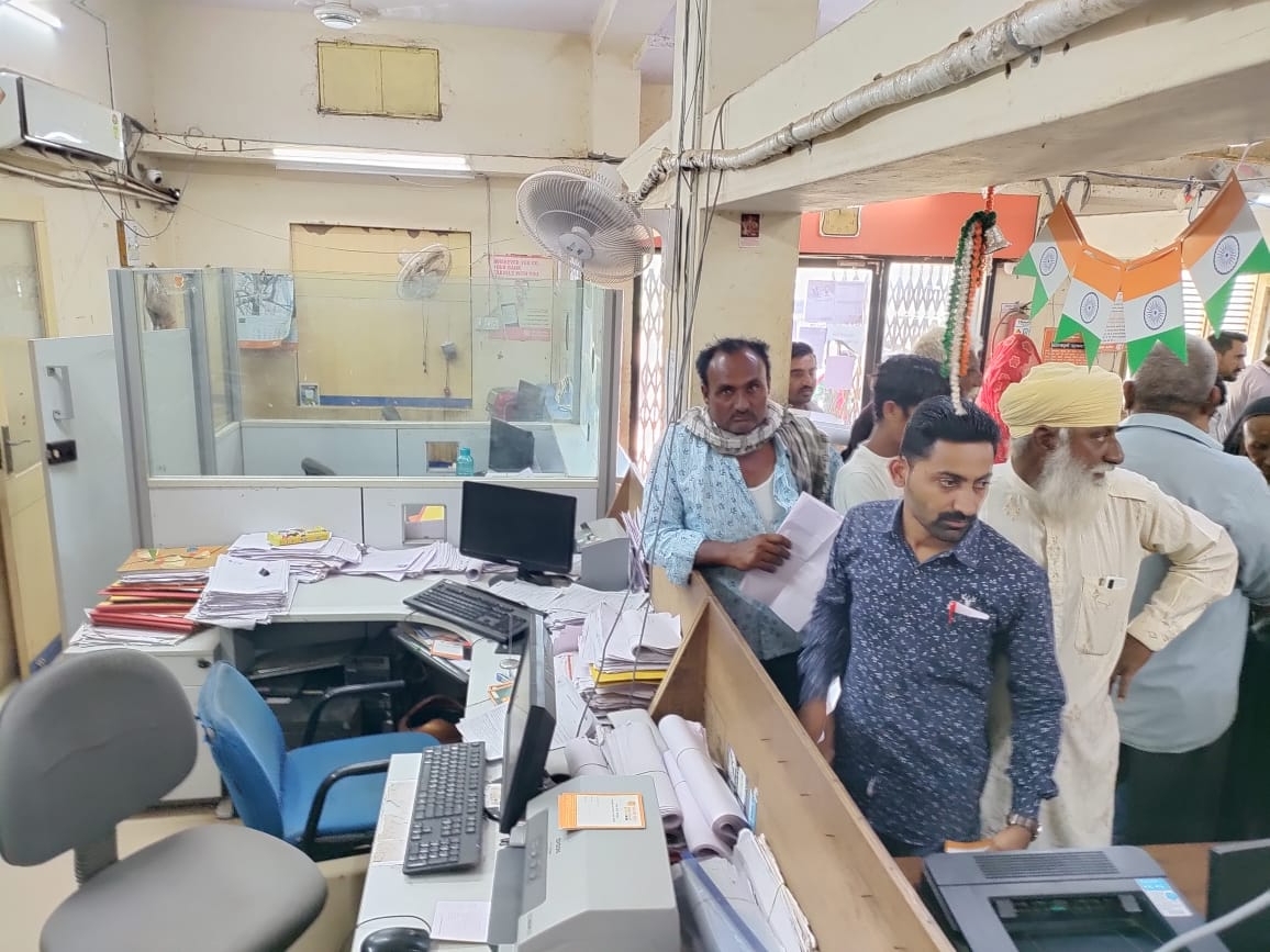 The next day in Dayapar, the cashier was absent from the Bank of Baroda ...