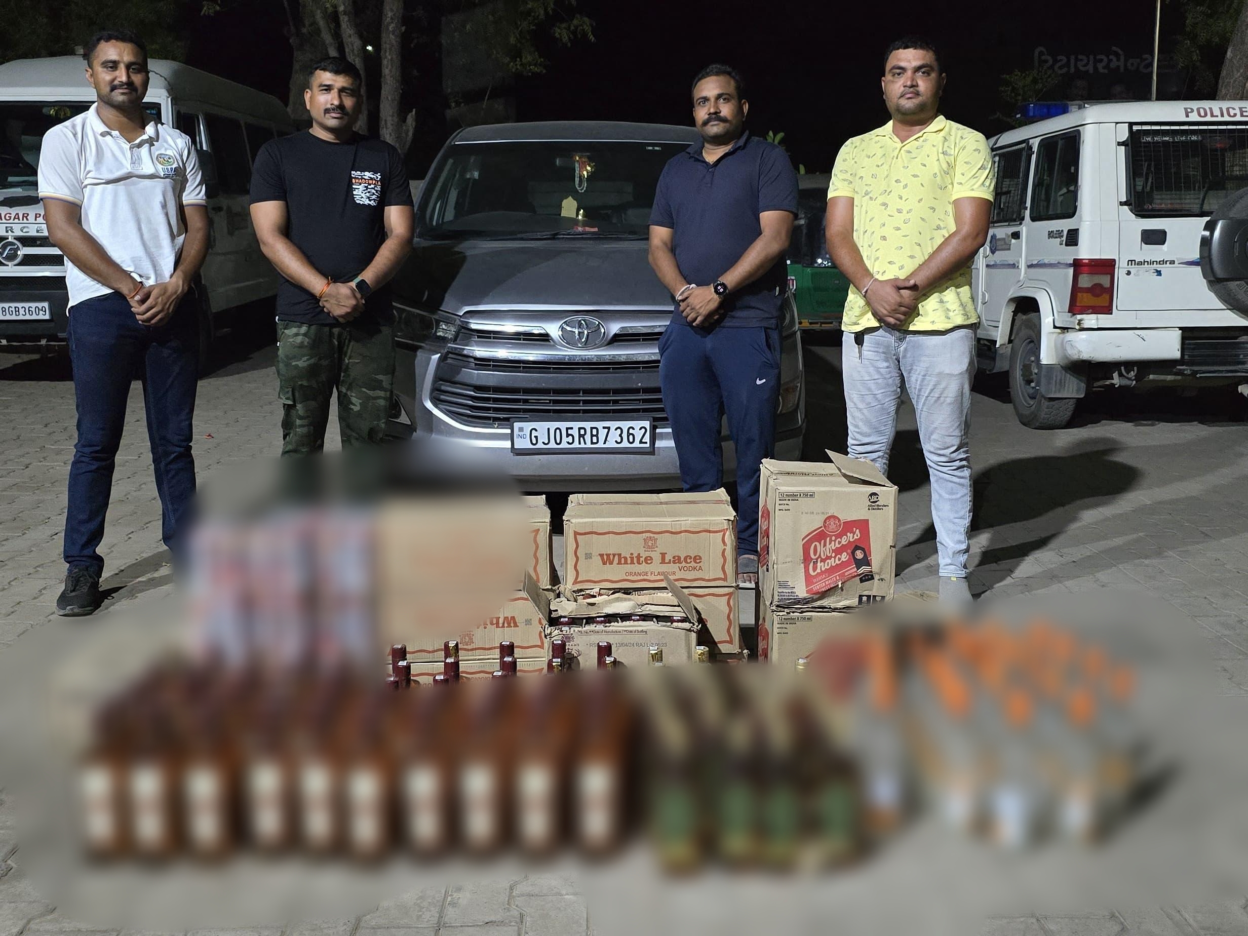 Liquor including quantity of beer from Innova car on Pansar Road, Kalol ...
