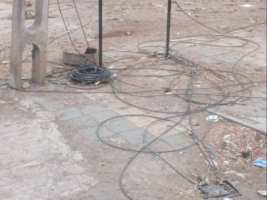 Installation of dish cable wires on power poles in Nadiad, demand that ...