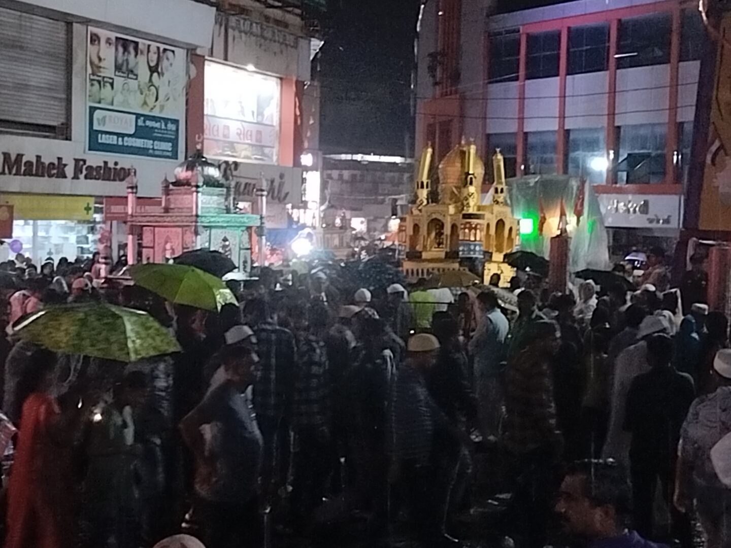 Meghmeher, people watch the artistic tajiya amid pouring rain during ...