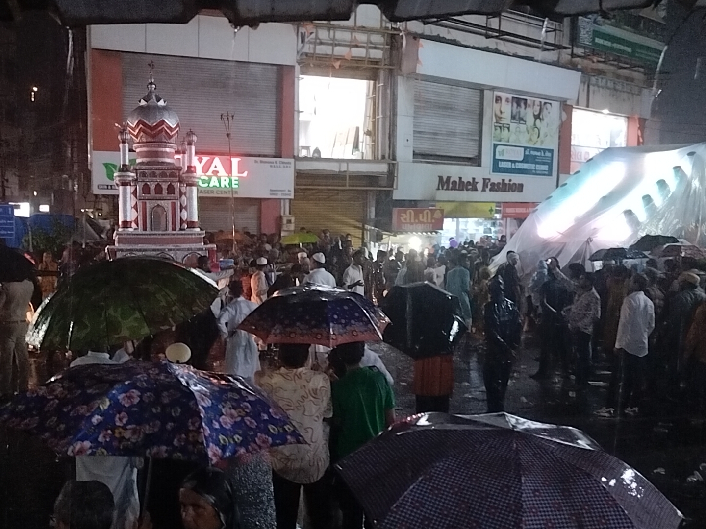 Meghmeher, people watch the artistic tajiya amid pouring rain during ...
