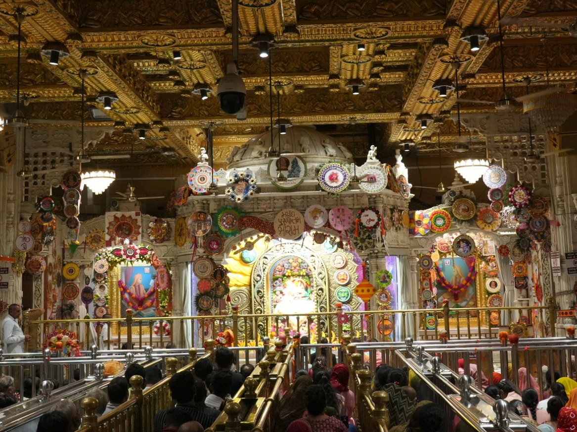 Sri Kashtabhanjandev Dada with sun god themed wagha and throne with 9 ...