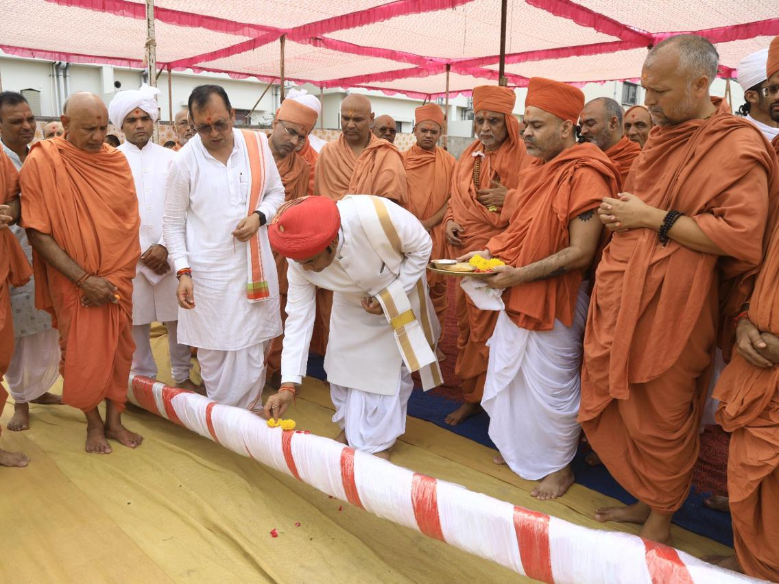 Saints hoisted the flag after flag pooja ceremony for the Maha Vishnu ...