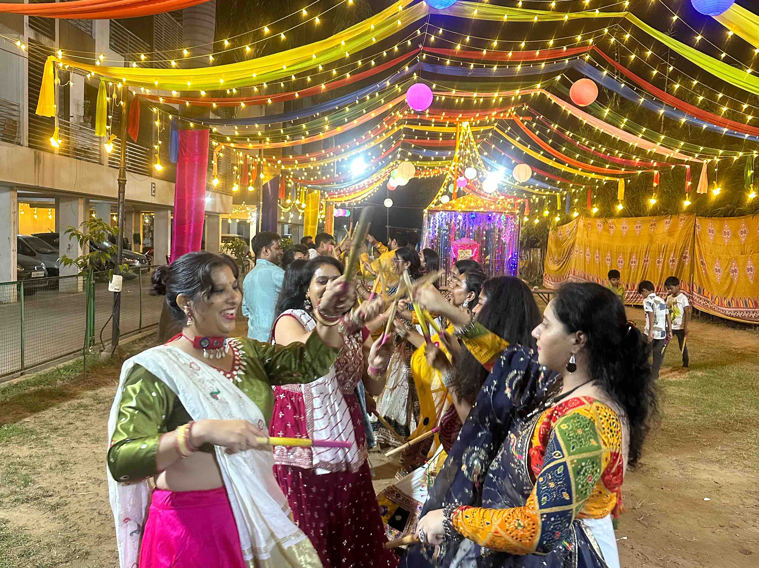 At Aryan Casa Society, people dressed in traditional dress and painted ...