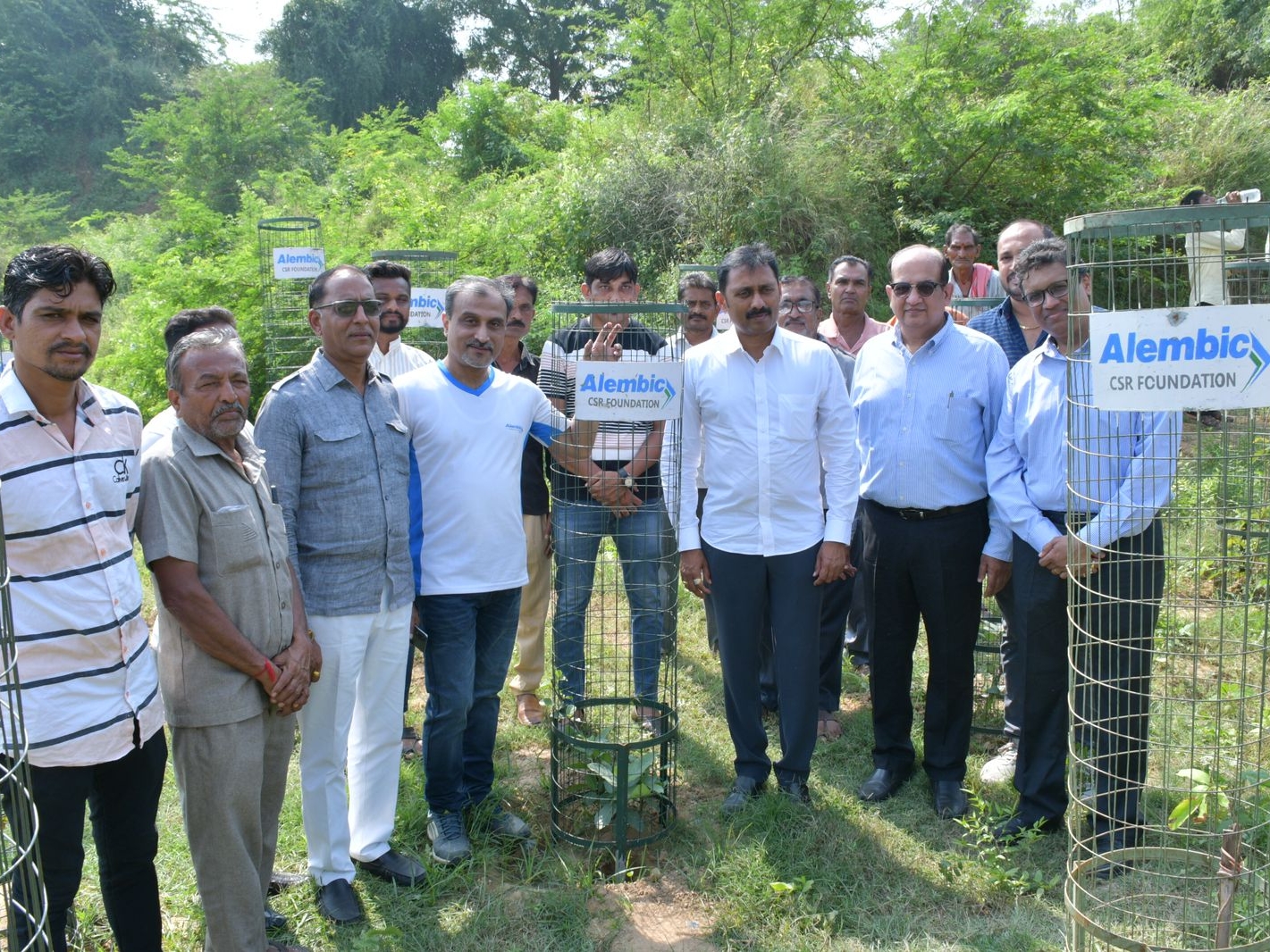 Alembic CSR Distribution of 400 tree guards by MLA Chaitanya Singh ...