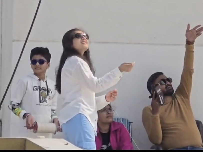 Kite-flyers gathered on the rooftops, worshipped the cow and enjoyed ...