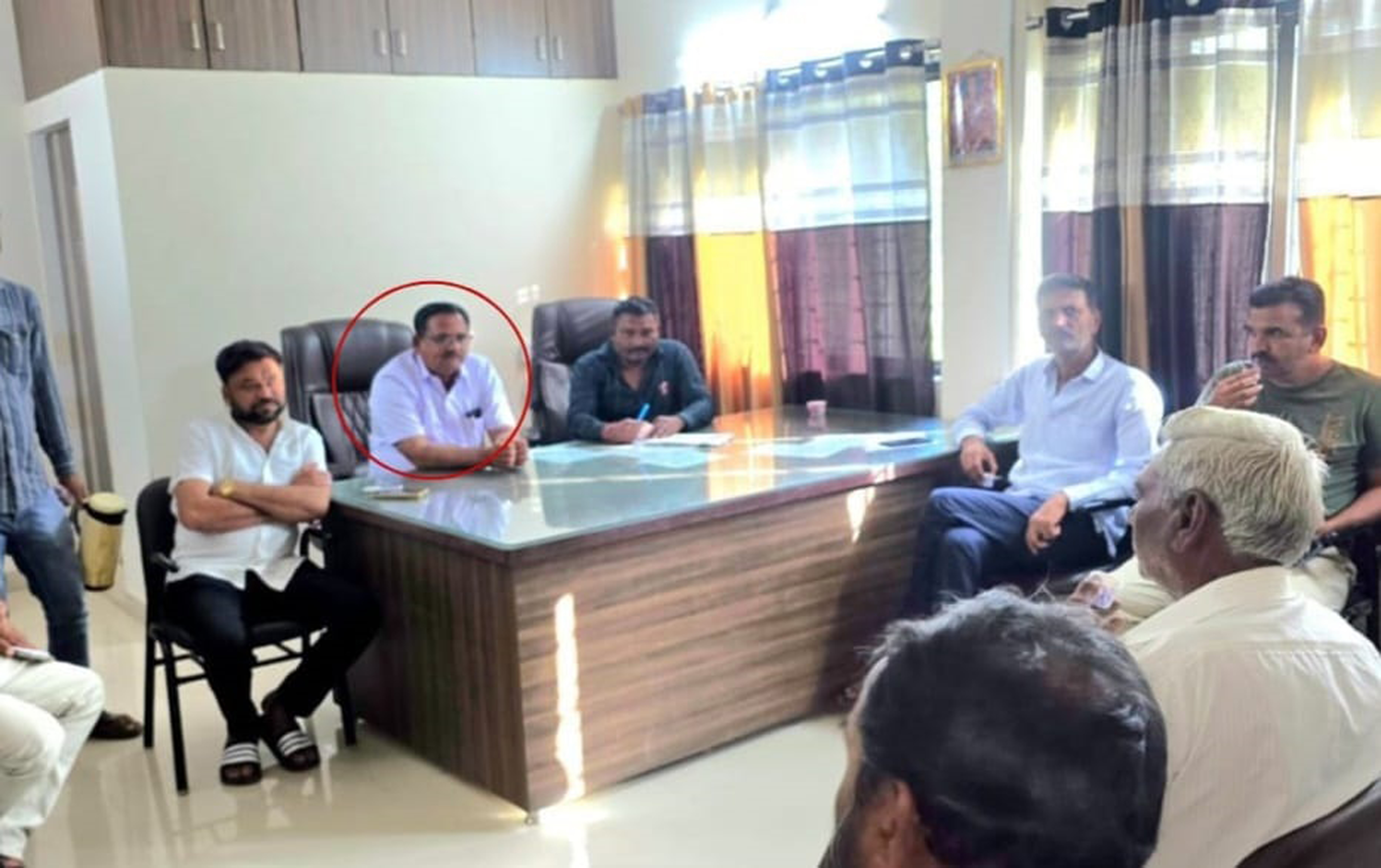 Husband sitting on the chair of the vice-president of Dhrol ...