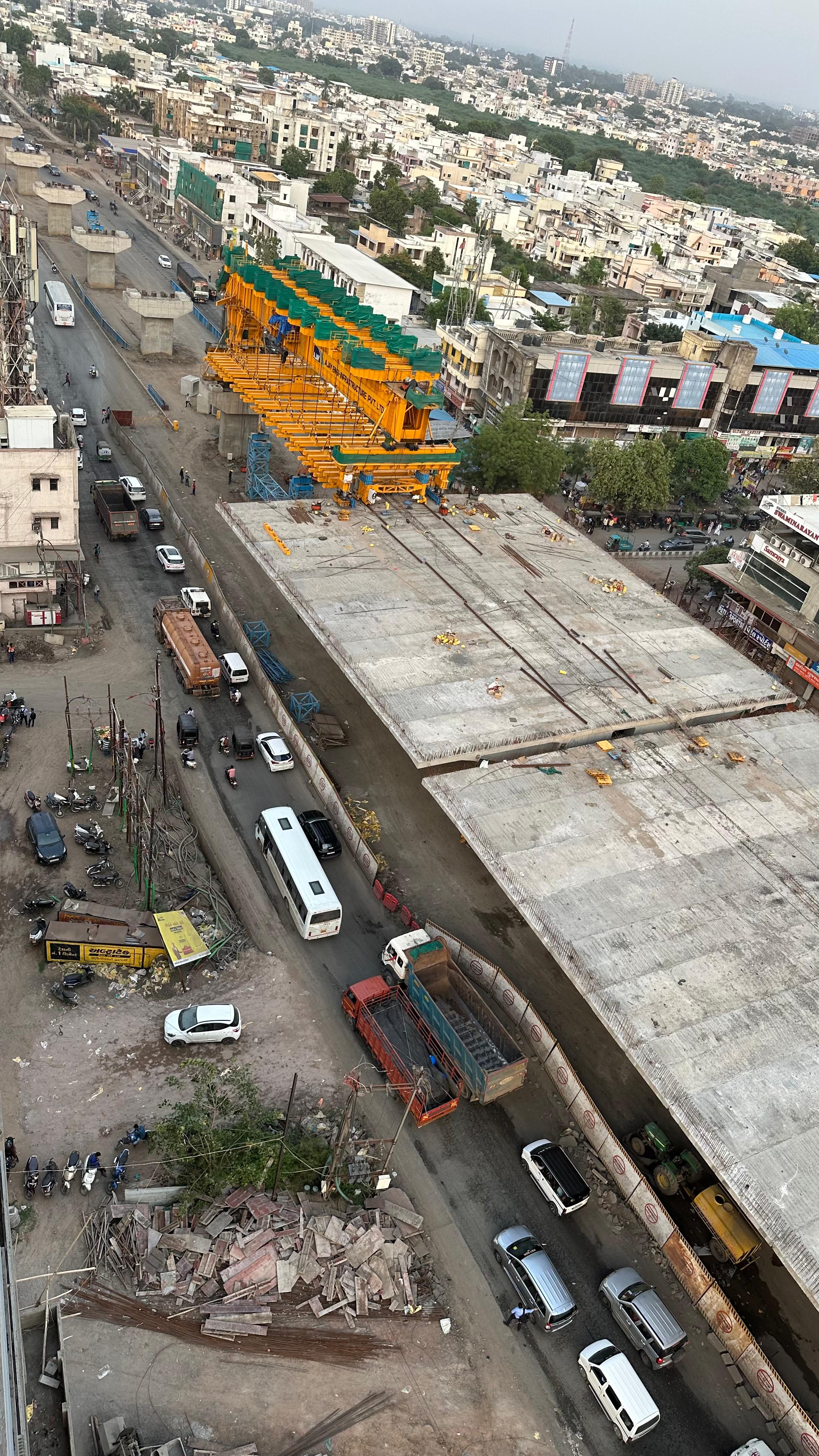 A 120-ton span for the elevated corridor is being installed every one ...