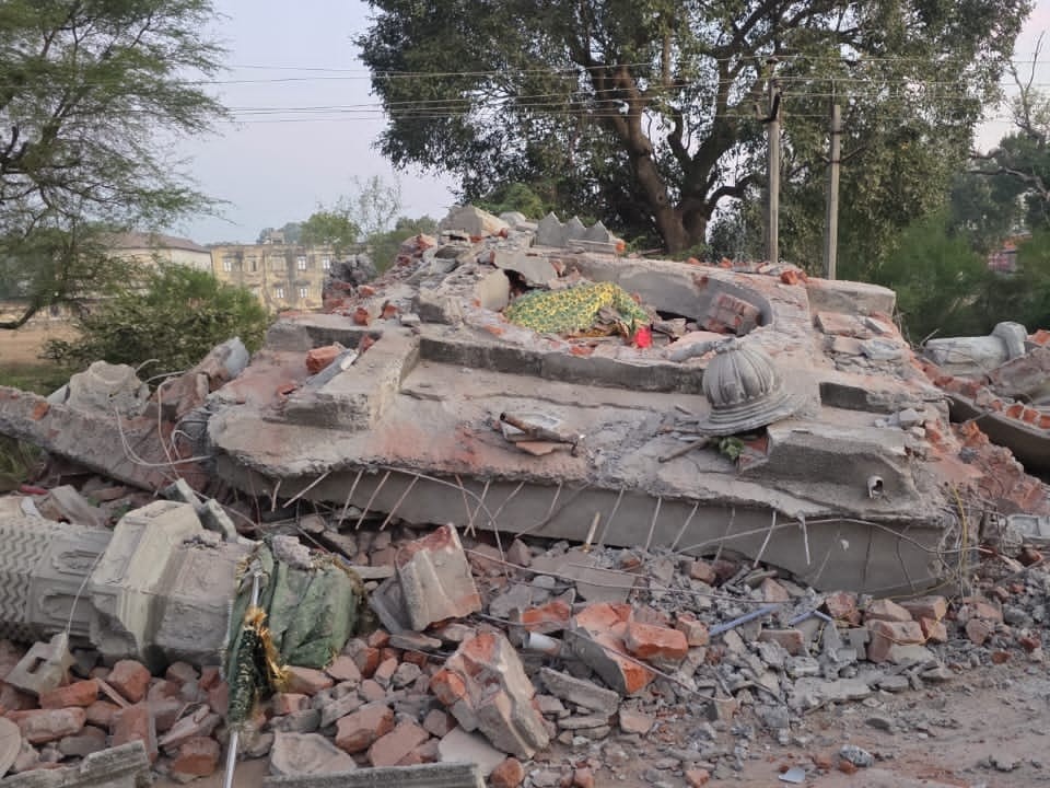 The government's bulldozer moved into Gandhinagar's Rakheja, removing ...