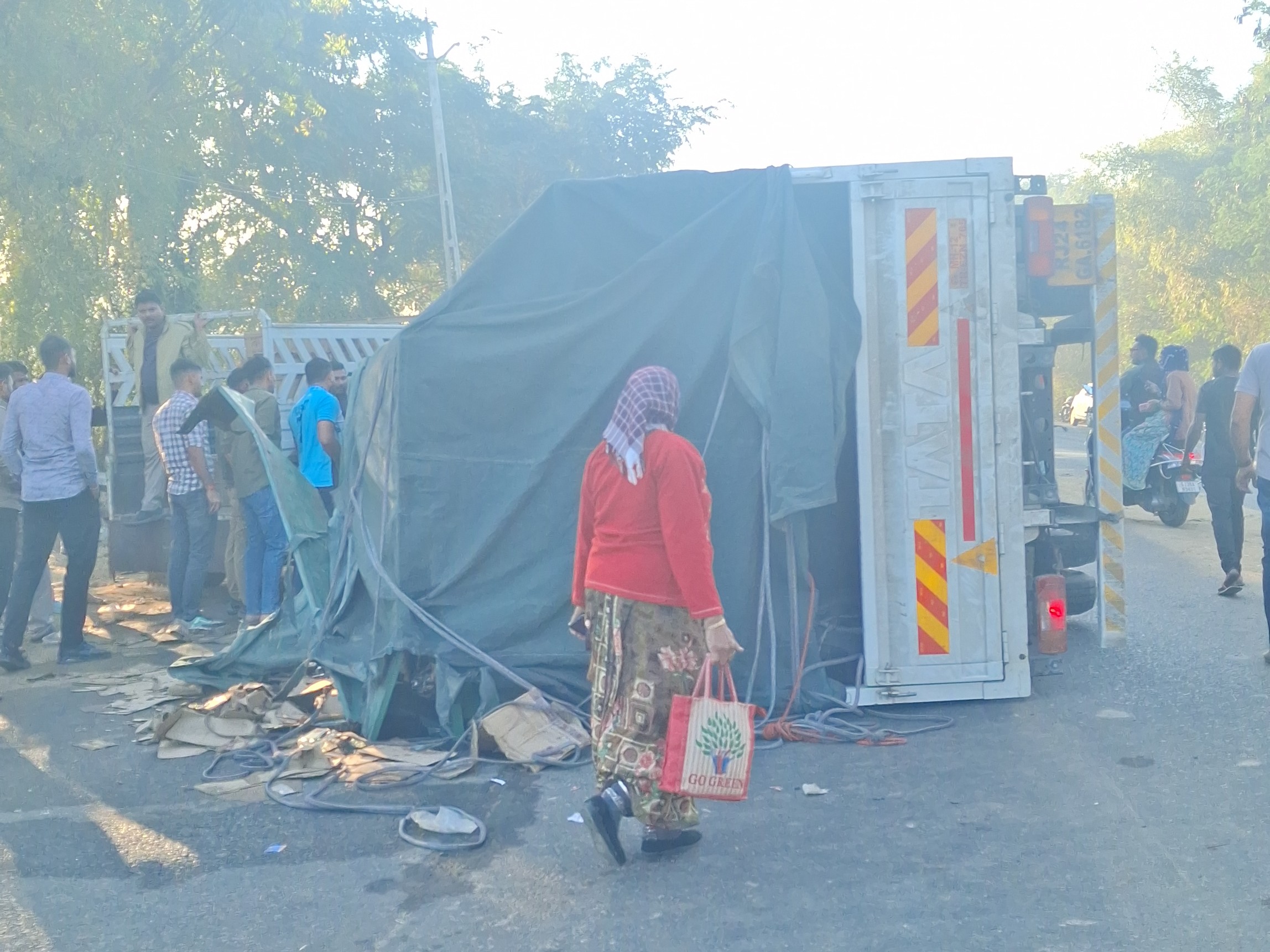 Sanand Liquor Filled Truck Overturns; Bootlegging Plan Fails PHOTOS ...