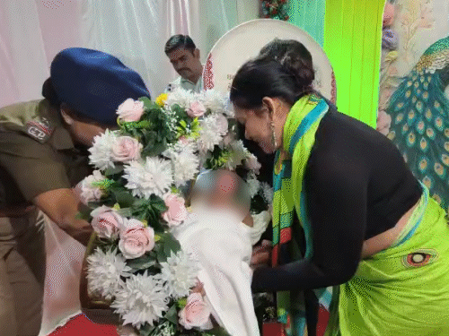 Police Commissioner performs naming ceremony as father to celebrate ...