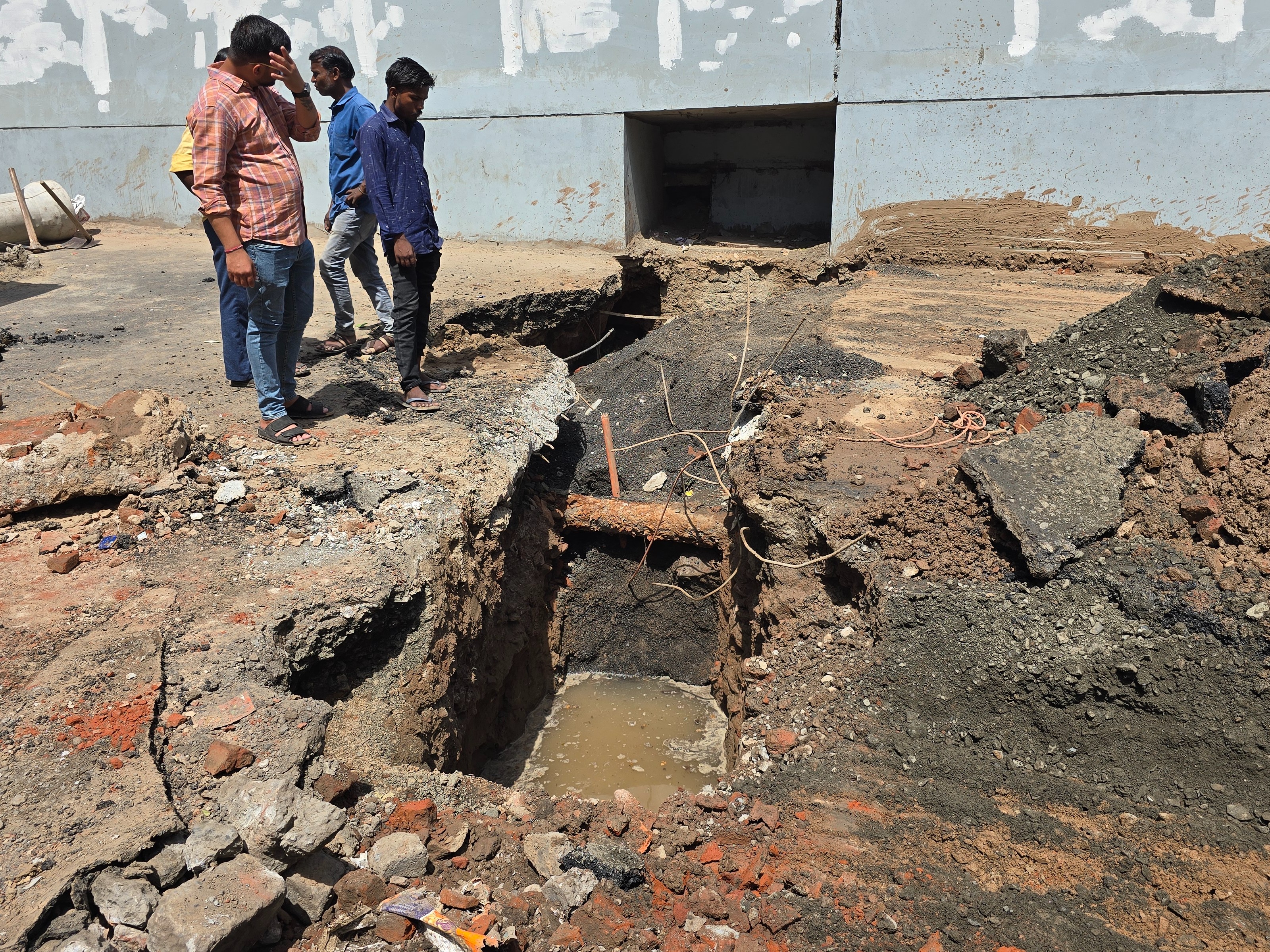 Ahmedabad Road Potholes: Drainage & Water Line Issues Cause Havoc